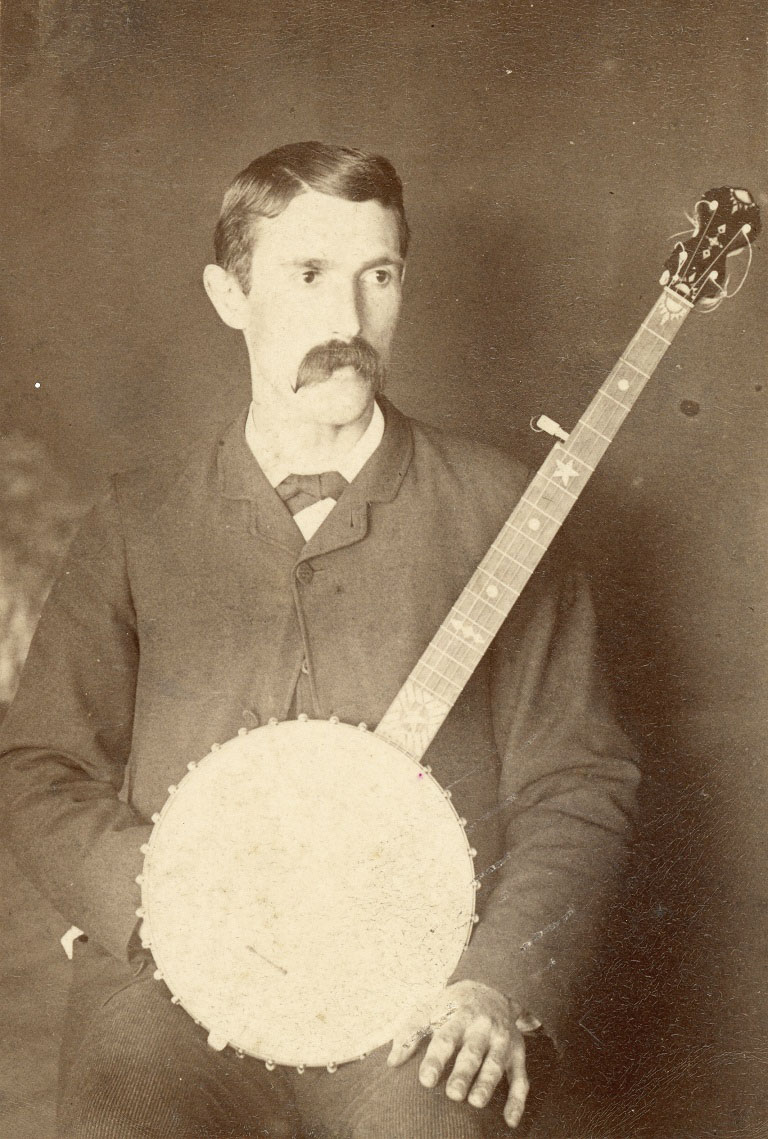 Man with banjo – Tokens of Companionship